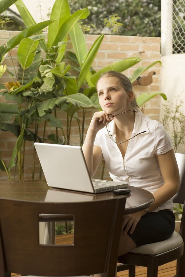Thoughtful Woman at Computer Stock Image - Image of caucasian, sitting ...