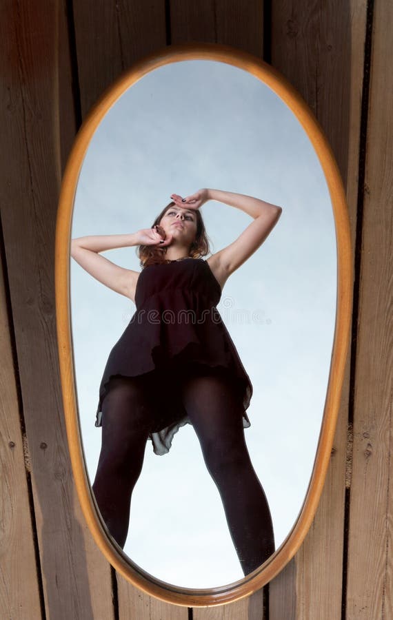 Thoughtful Woman with Her Reflection in Mirror Stock Photo - Image of ...