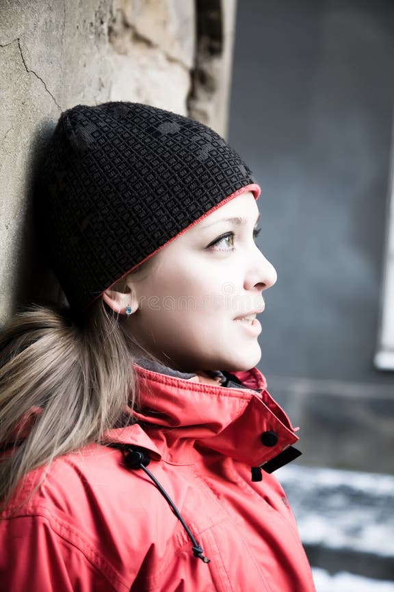 Thoughtful Woman beside Old Wall Stock Photo - Image of building ...