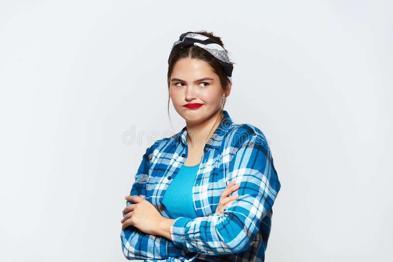 Thoughtful Woman Pondering at Studio. Serious Girl Thinking Serious ...