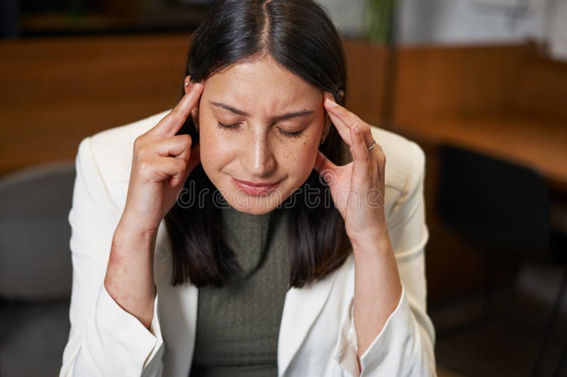 Thoughtful Woman in Professional Setting Facing Workplace Challenges ...
