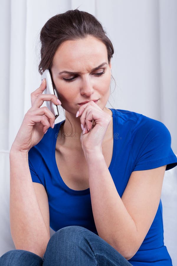 Thoughtful Woman Talking on the Phone Stock Photo - Image of female ...