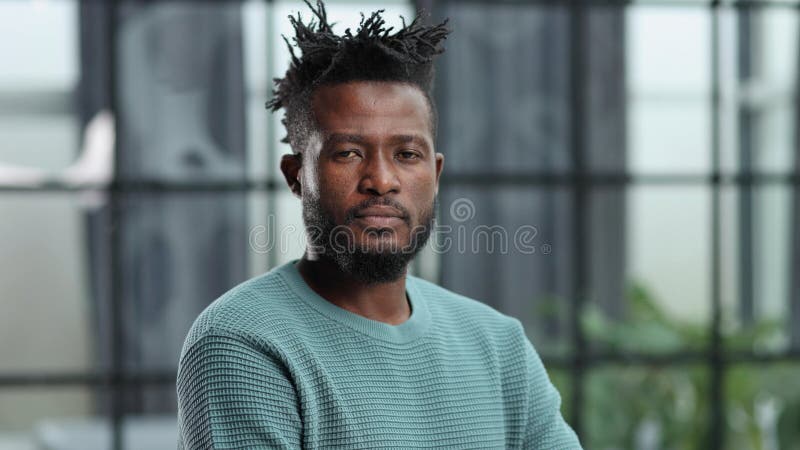 Thoughtful Young Black Man Looking Straight Ahead Stock Image - Image ...