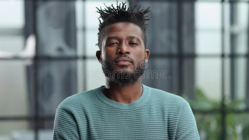 Thoughtful Young Black Man Looking Straight Ahead Stock Image - Image ...