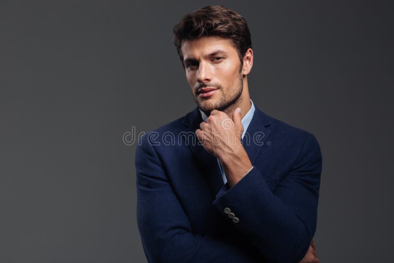 Thoughtful Young Brunette Man in Blue Jacket Thinking about Something ...
