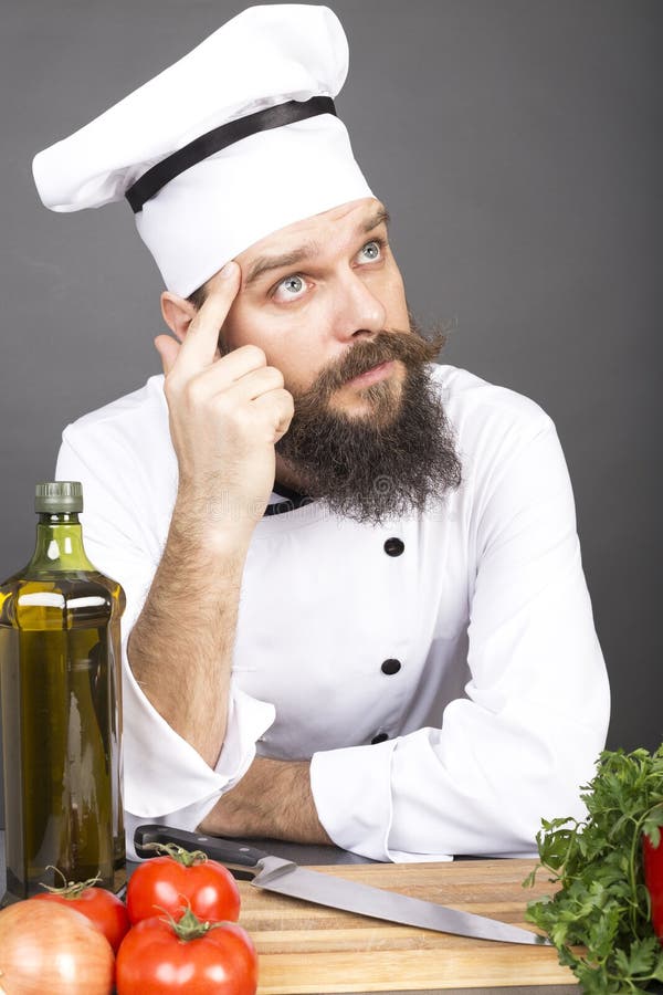 Thoughtful Chef in Red Uniform Restaurant Cook Readily Providing Dish ...