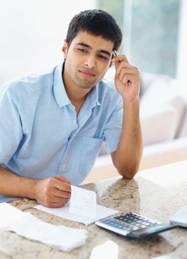 Thoughtful Young Guy Doing Monthly Calculations Stock Photo - Image of ...