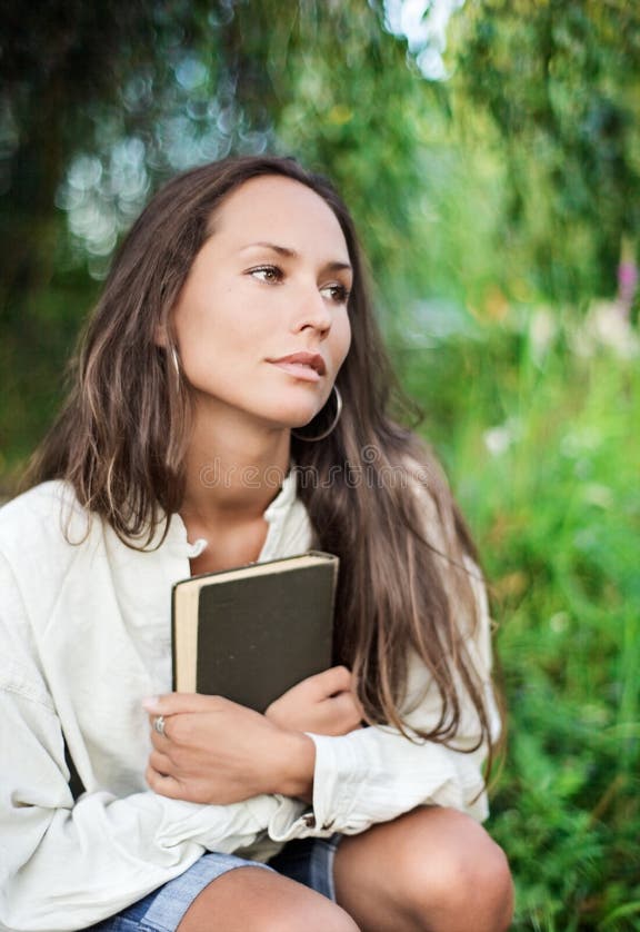 Thoughtful Young Lady with Book Stock Photo - Image of lady, learning ...