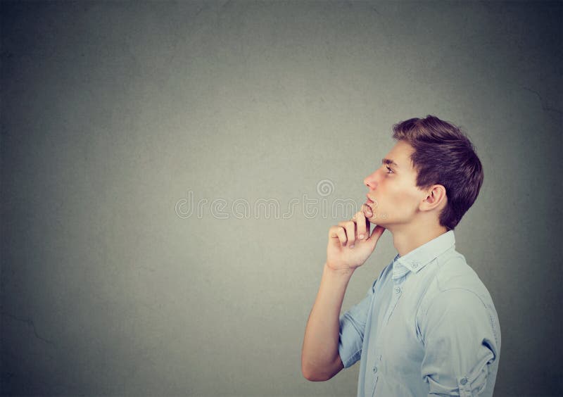 Thoughtful Young Family Mother Father and Their Child Looking Up ...
