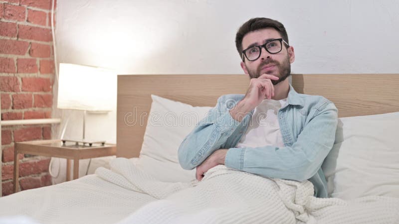Thoughtful Young Man Thinking in Bed Stock Image - Image of planning ...