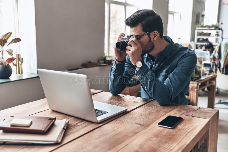 Checking camera. stock image. Image of ethnicity, organization - 115881119