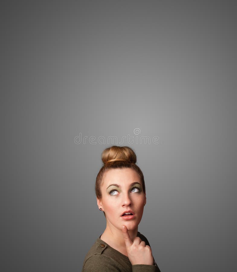 Thoughtful Young Woman Gesturing with Copy Space Stock Photo - Image of ...
