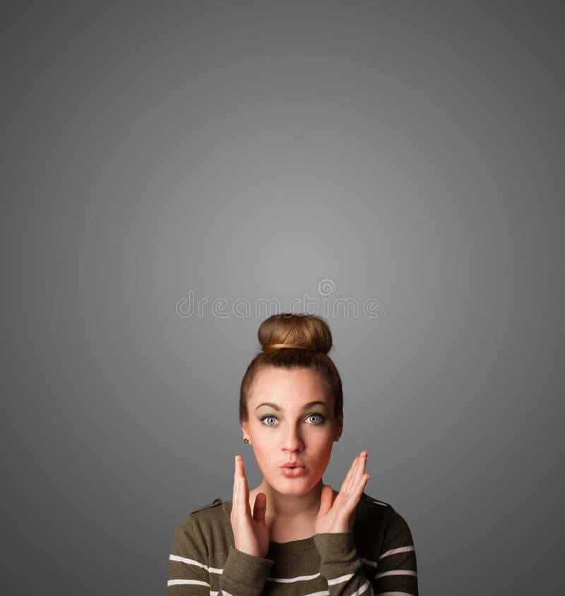 Thoughtful Young Woman Gesturing with Copy Space Stock Image - Image of ...