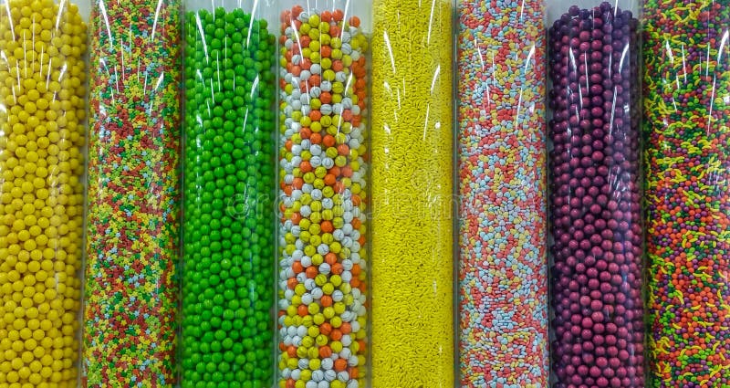 Thousands of Colorful Candies in Plastic Tubes Stock Photo - Image of ...