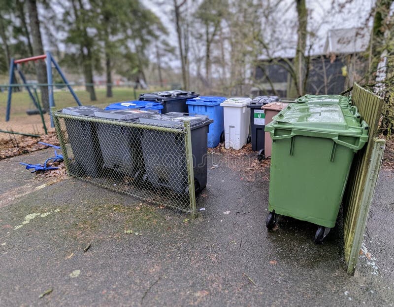 Thrash Bins in a Community. Sorting Bins. Garbage. Recycle Bins ...