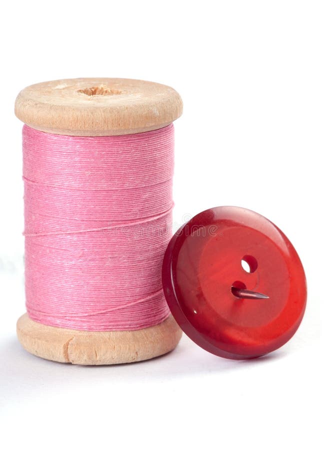 Thread and a Button with a Needle Stock Photo - Image of fashioned ...