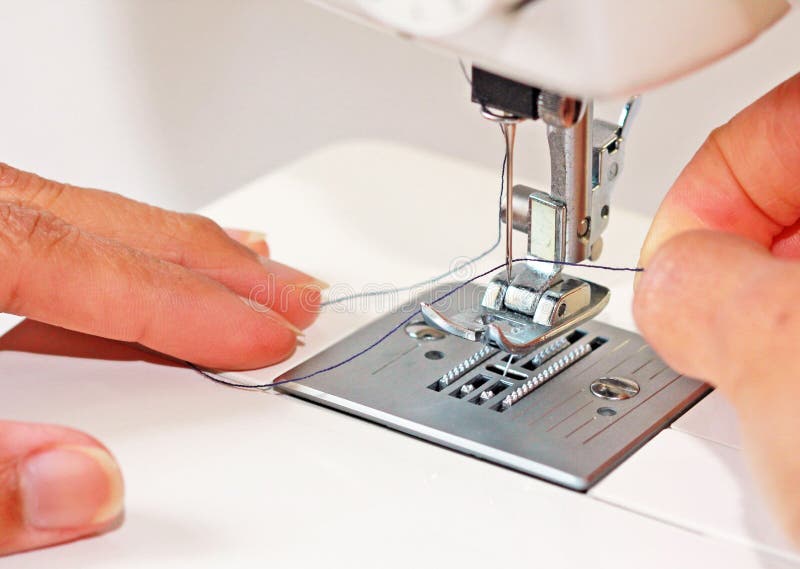Thread and Hands stock photo. Image of sewing, thread - 15089990