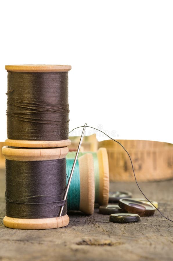 Thread and Needle with Buttons Stock Photo - Image of buttons, string ...