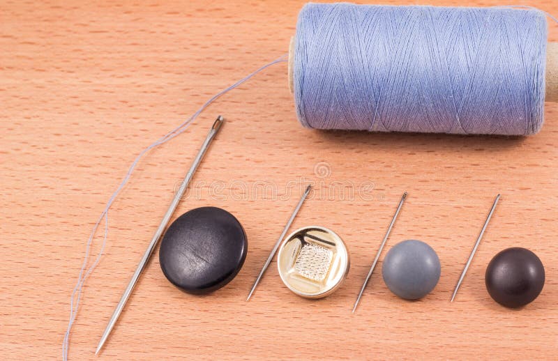Thread a Needle and Buttons Stock Image - Image of background, acute ...