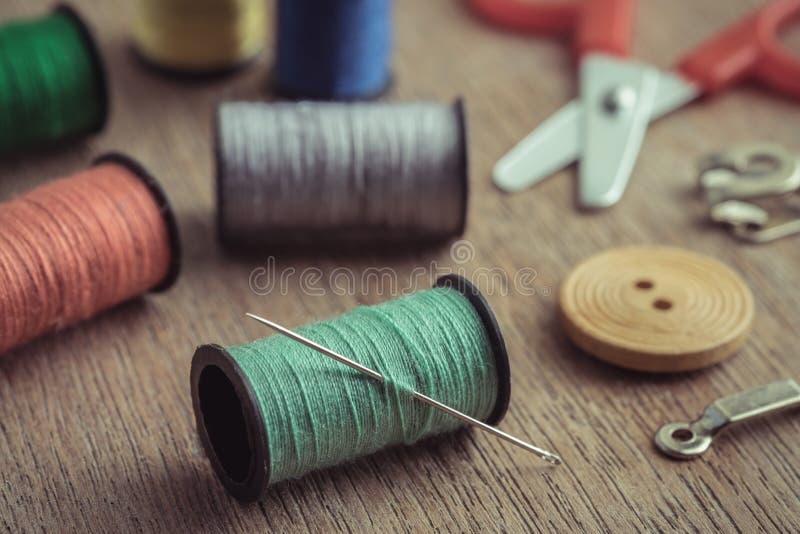 Thread with Needle and Scissors on Wooden Table, Vintage Tone Stock ...