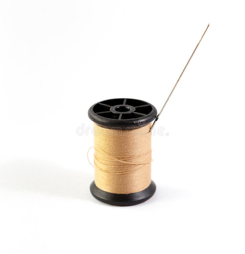 Spool of Brown Thread and Needle Stock Image - Image of brown, cotton ...