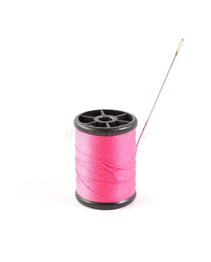 Spool of Pink Thread and Needle Stock Photo - Image of textile, sewing ...