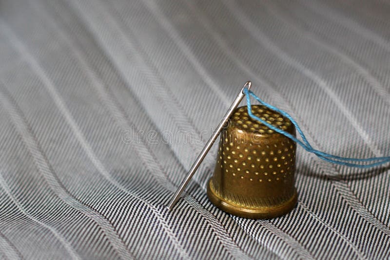 Thread, needle and thimble stock image. Image of atelier - 106276373