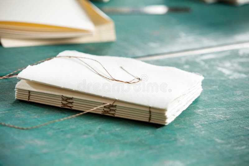 Thread and Papers on Table in Factory Stock Photo - Image of handmade ...