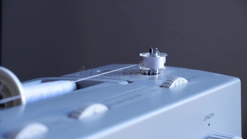 Thread from the Sewing Machine is Rotated on the Spindle Stock Video ...