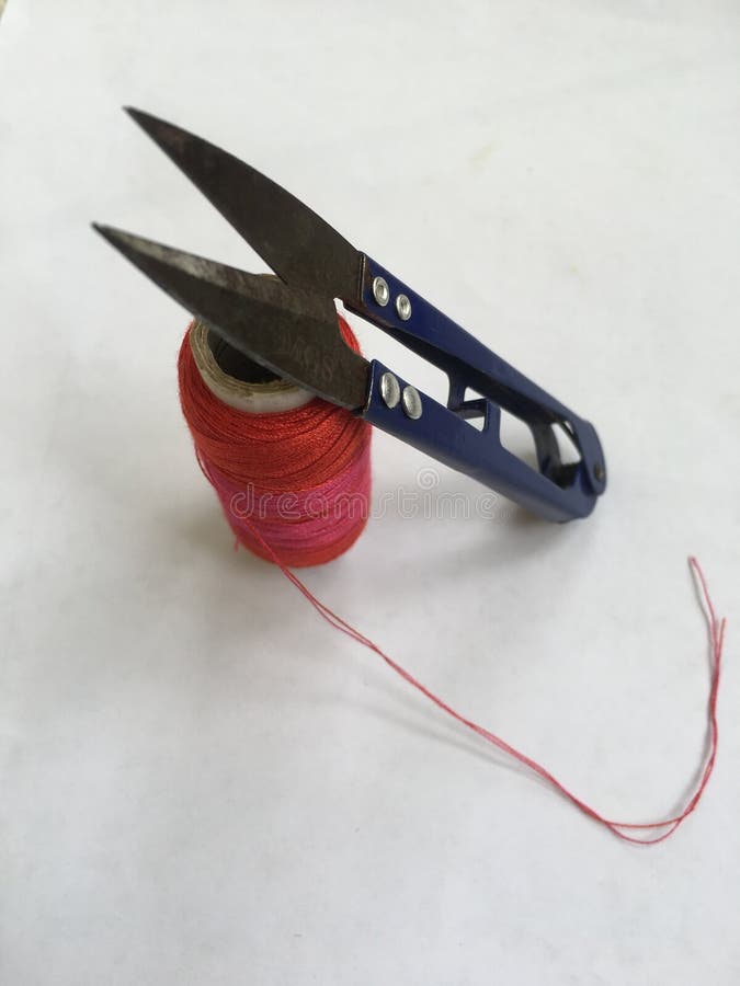 A Spool of Thread with a Knife. Stock Image - Image of blade, metal ...