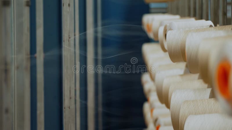 Thread Spools. Close-up. Racks with Many Thread Spools. the Process of ...