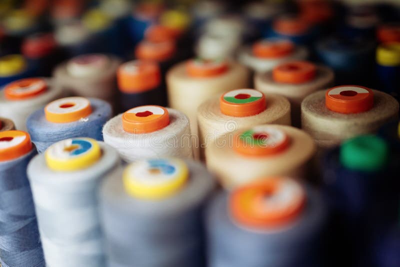 Thread Spools in Fabric Industry Stock Photo - Image of design, color ...