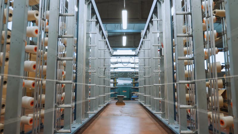 Thread Spools. Textile Industry. Weaving Factory. Racks with Many ...