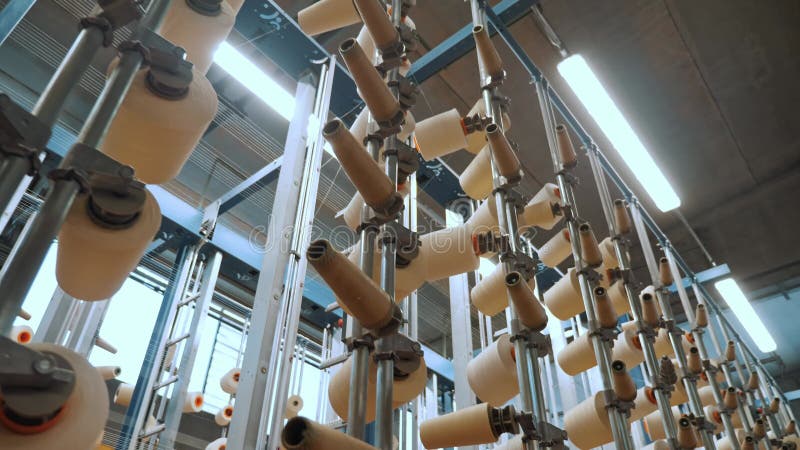 Thread Spools. Textile Industry. Weaving Factory. Racks with Many ...