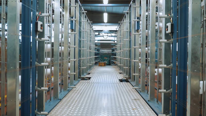 Thread Spools. Textile Industry. Weaving Factory. Racks with Many ...
