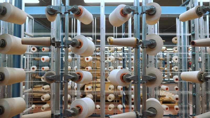 Thread Spools. Textile Industry. Weaving Factory. Racks with Many ...