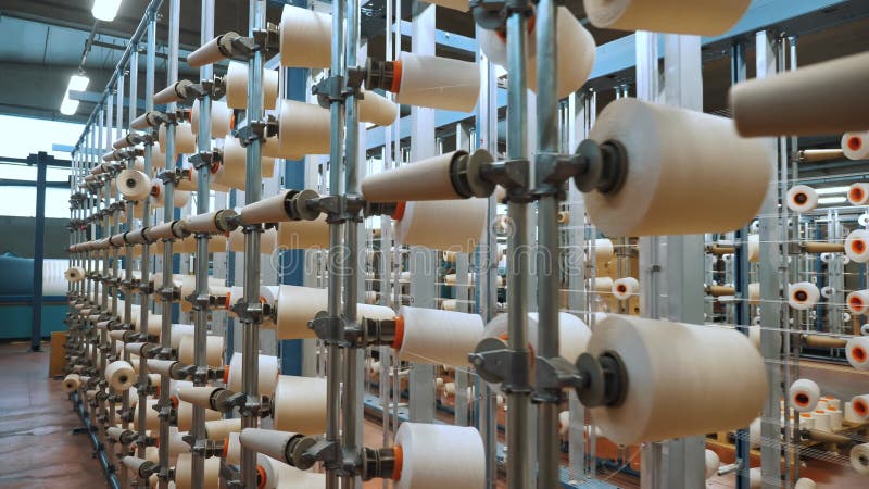 Thread Spools. Textile Industry. Weaving Factory. Racks with Many ...