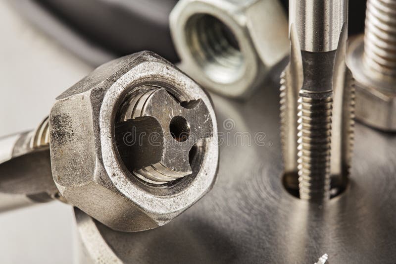 Thread Tap Drill Steel Billet with Drill Bit on Background. Working ...