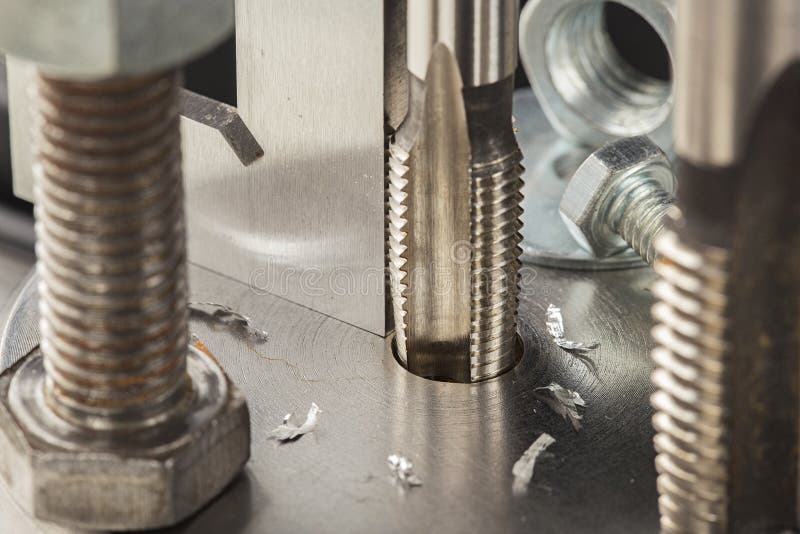 Thread Tap Drill Steel Billet with Drill Bit on Background. Working ...