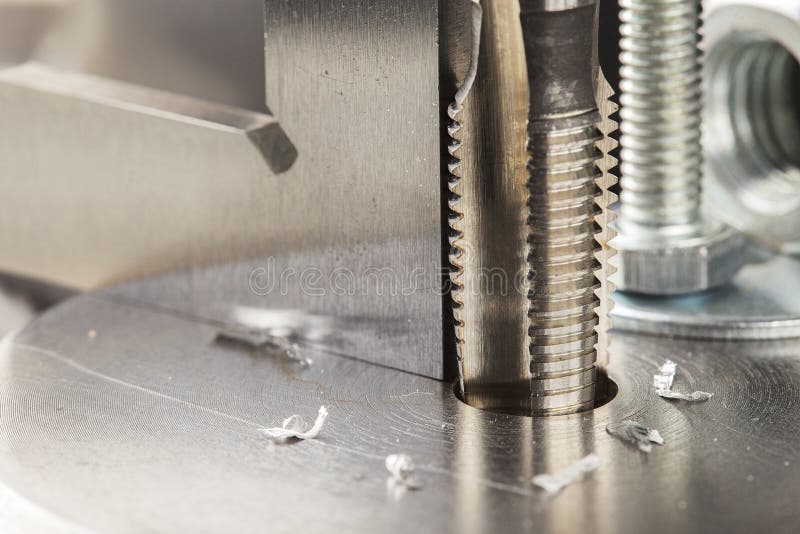 Thread Tap Drill Steel Billet with Drill Bit on Background. Working ...