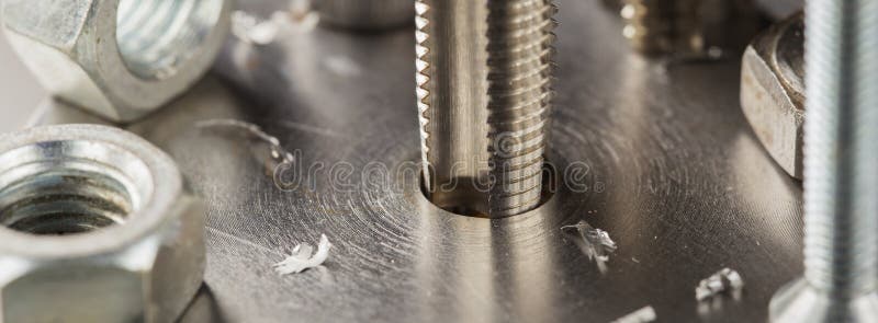 Thread Tap Drill Steel Billet with Drill Bit on Background. Working ...