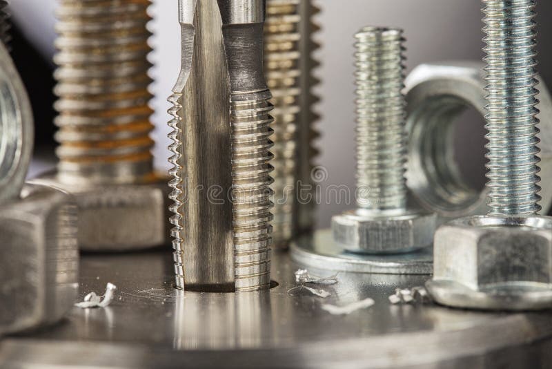 Thread Tap Drill Steel Billet with Drill Bit on Background. Working ...