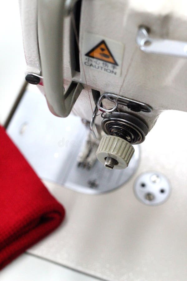 Thread Tension Regulator on an Industrial Sewing Machine. at the Bottom ...