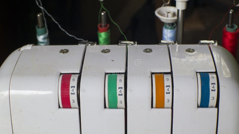 Thread Tension Setting on a Two Needle Overlock Sewing Machine. Stock ...