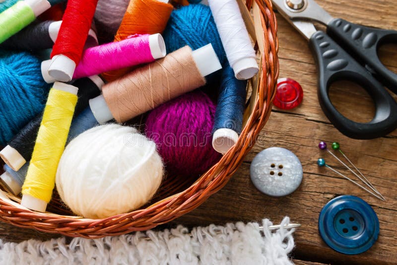 Thread and Yarn in a Basket Next To the Buttons Stock Photo - Image of ...