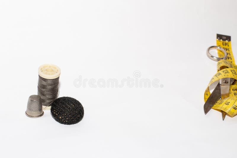 Thread, Yellow Measuring Tape on a Tabletop Next To the Scissors Stock ...