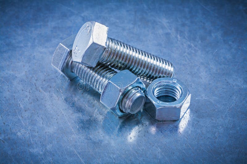 Threaded Bolt Details with Screw-nuts on Metallic Background Con Stock ...