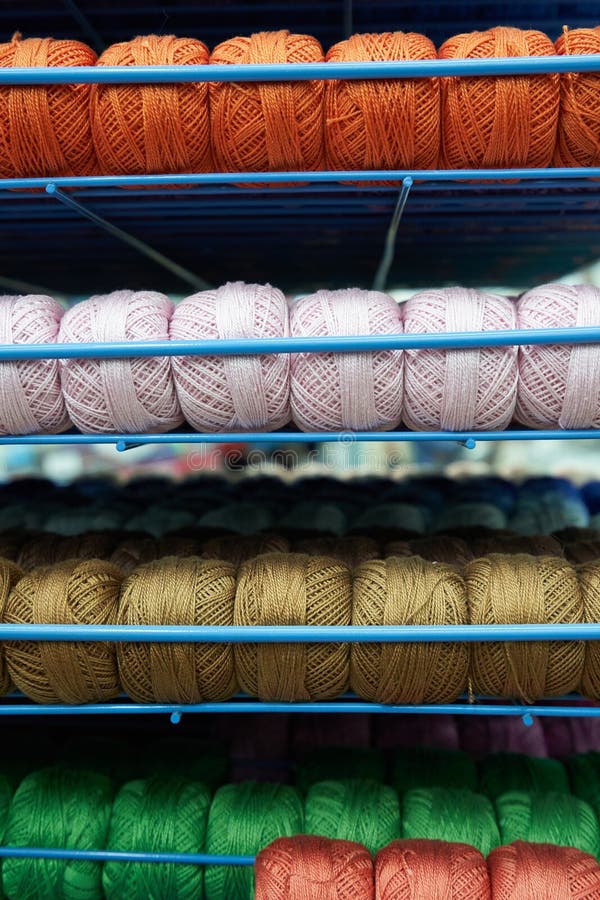 Threads for Knitting Different Colors on the Shelf in the Store. Close ...
