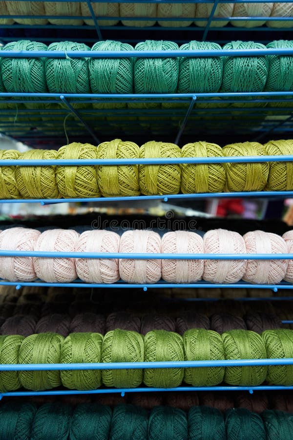 Threads for Knitting Different Colors on the Shelf in the Store. Close ...