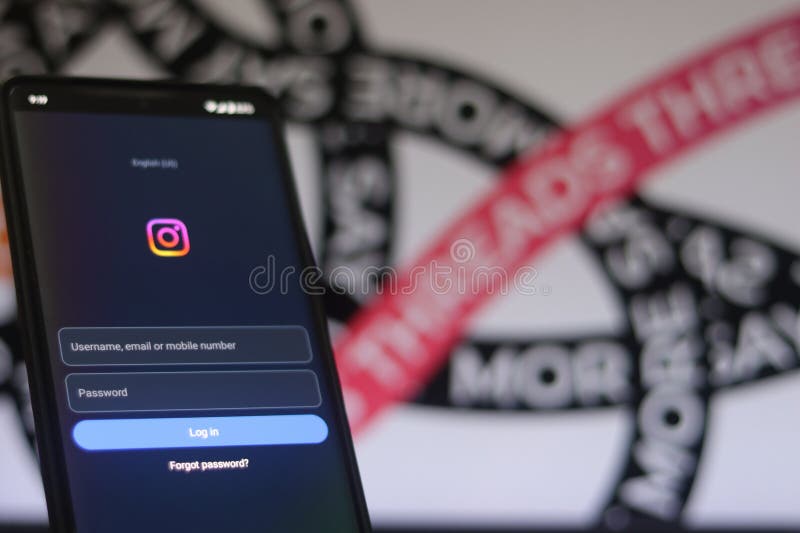 Threads Login Screen in a Phone, the Threads Logo is Displayed on a ...